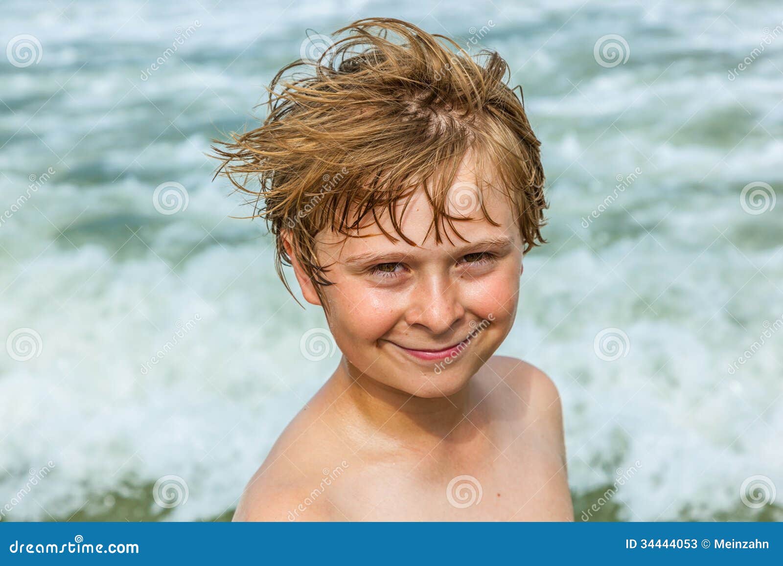 Smiling boy at the beach stock image. Image of body, hair - 34444053