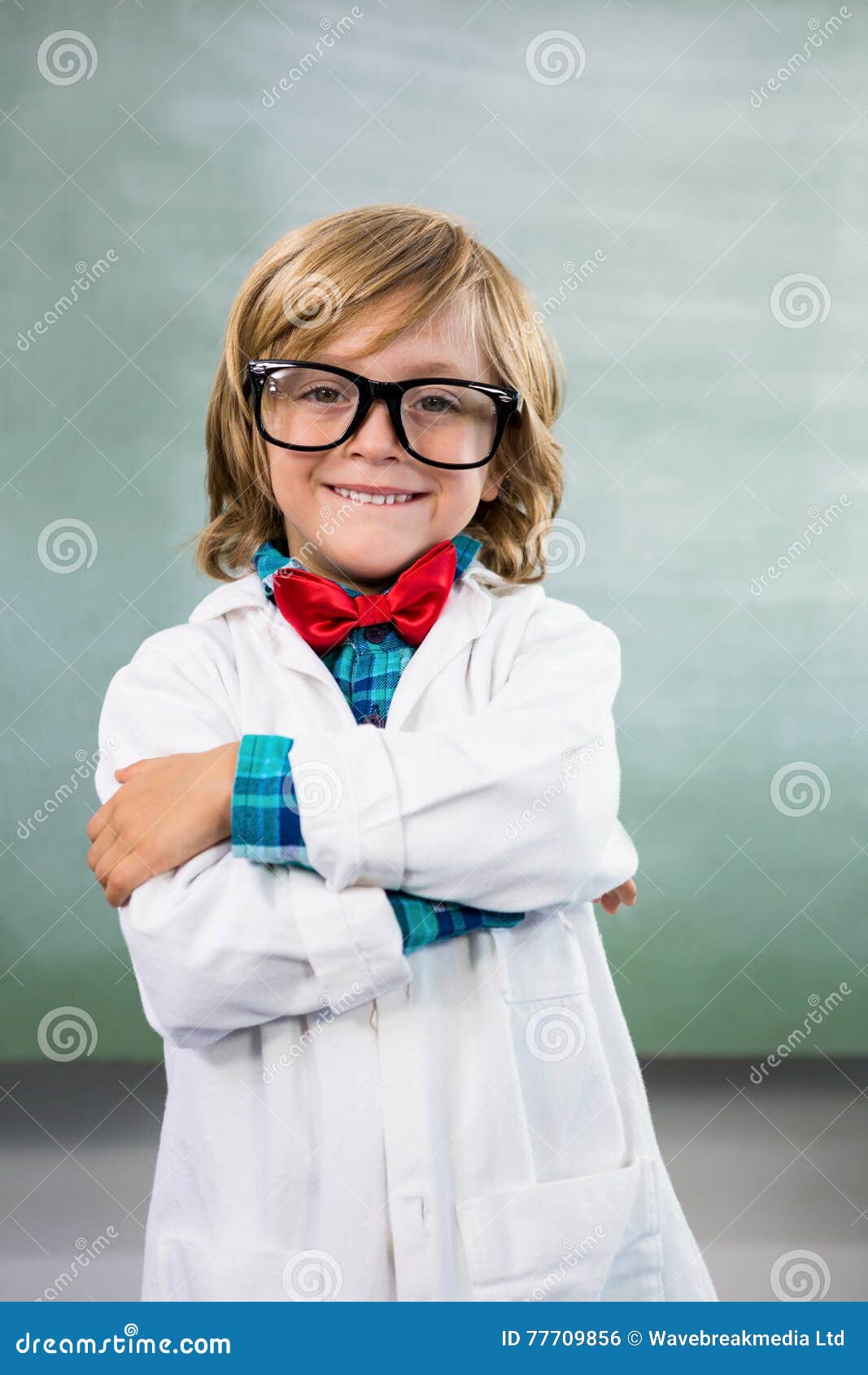 Smiling Boy Dressed As Scientist Standing in Classroom Stock Photo ...