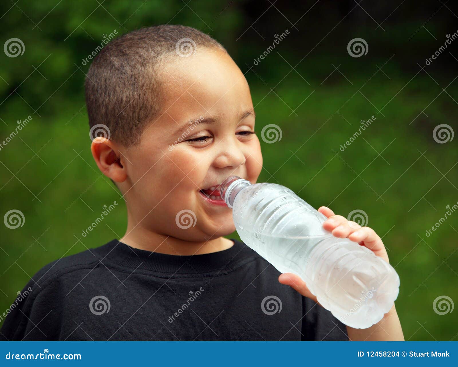 Smiling boy drinking stock photo. Image of child, latino - 12458204