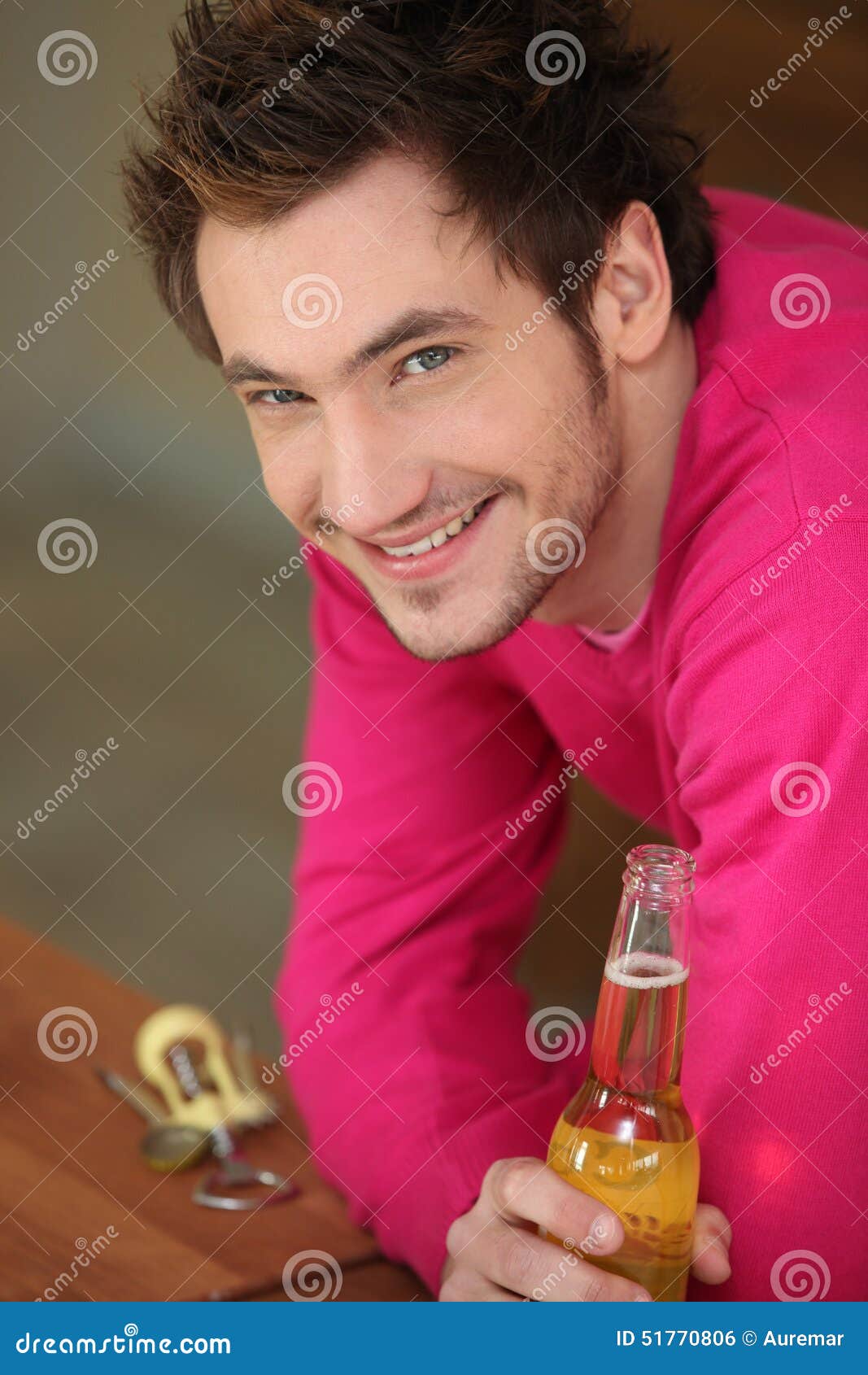 Smiling boy drinking beer stock photo. Image of male - 51770806