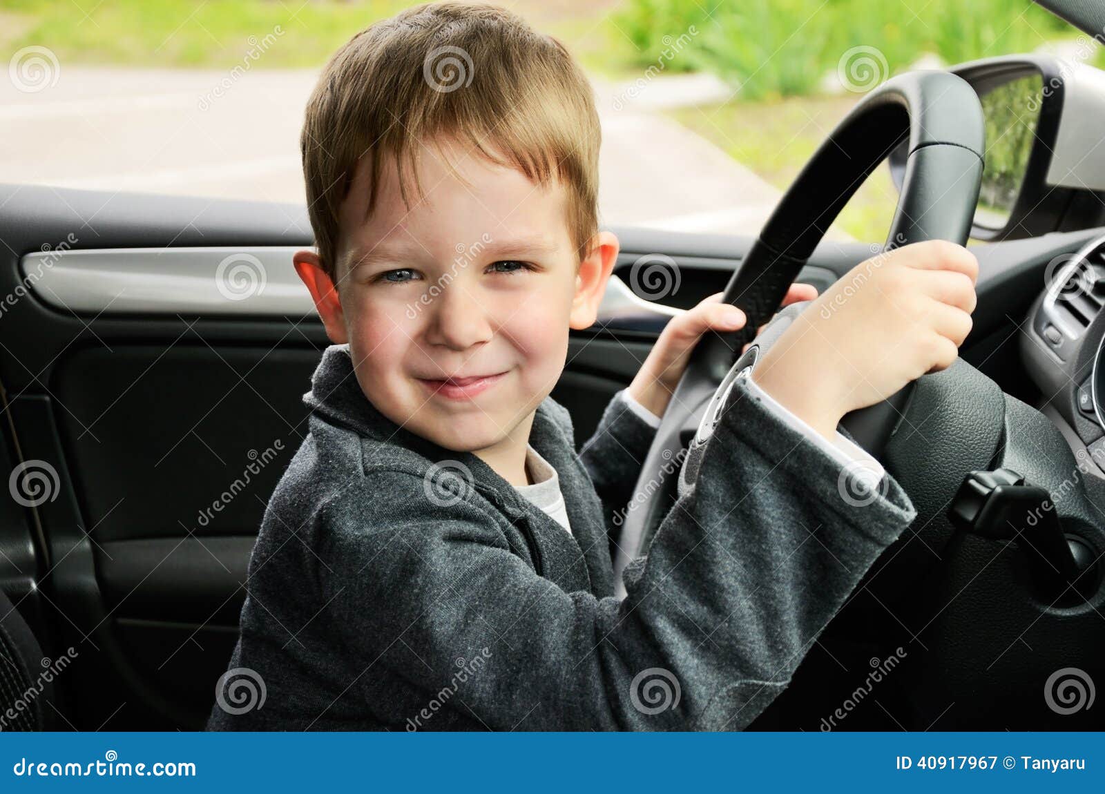 Smiling Boy Driving Horizontal Stock Image - Image of driving ...