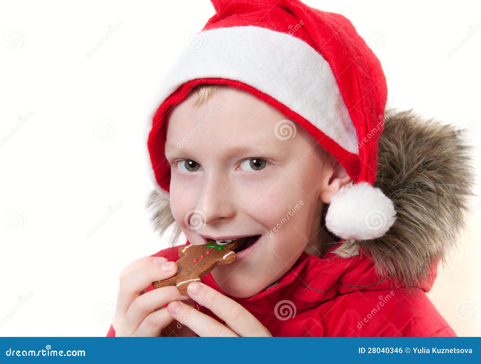 Smiling Boy Eating Gingerbread Man. Stock Photo - Image of background ...