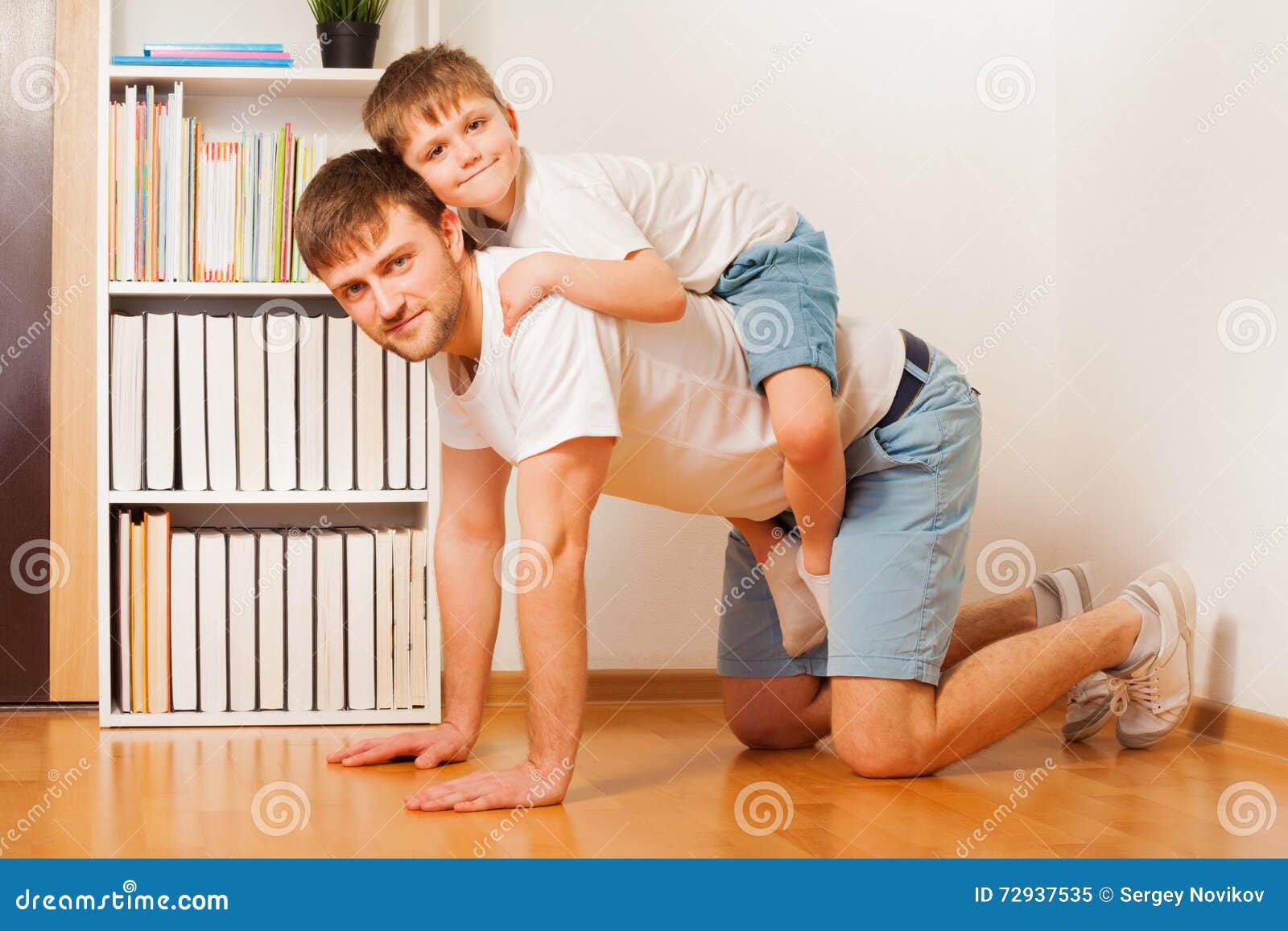 Smiling Boy Enjoys Riding on Father S Back Stock Image - Image of ...