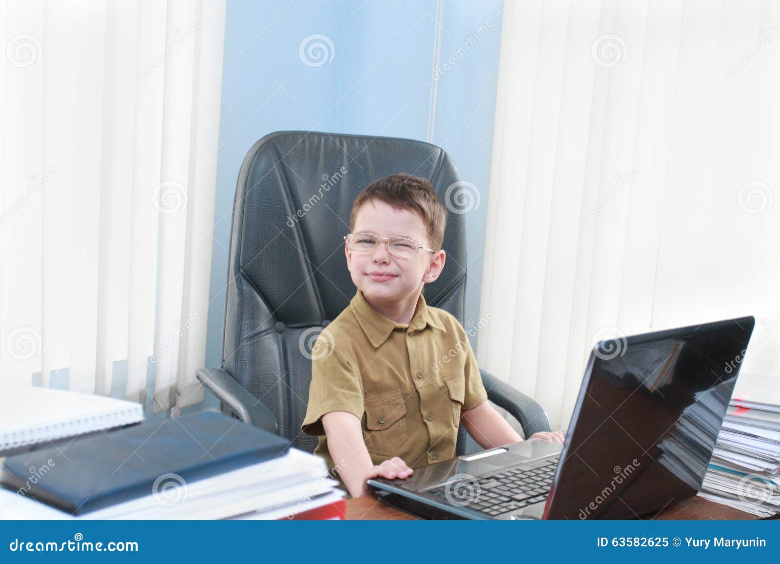 Smiling Boy with the Laptop Stock Image - Image of indoors, looking ...