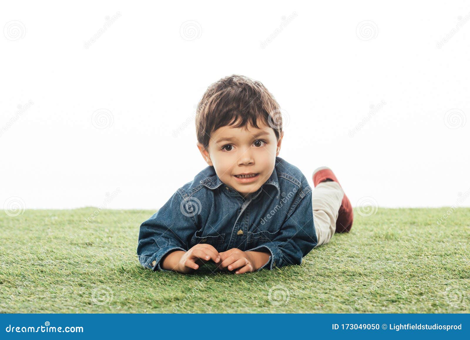 Smiling Boy Looking Away and Lying Stock Photo - Image of relax, grass ...