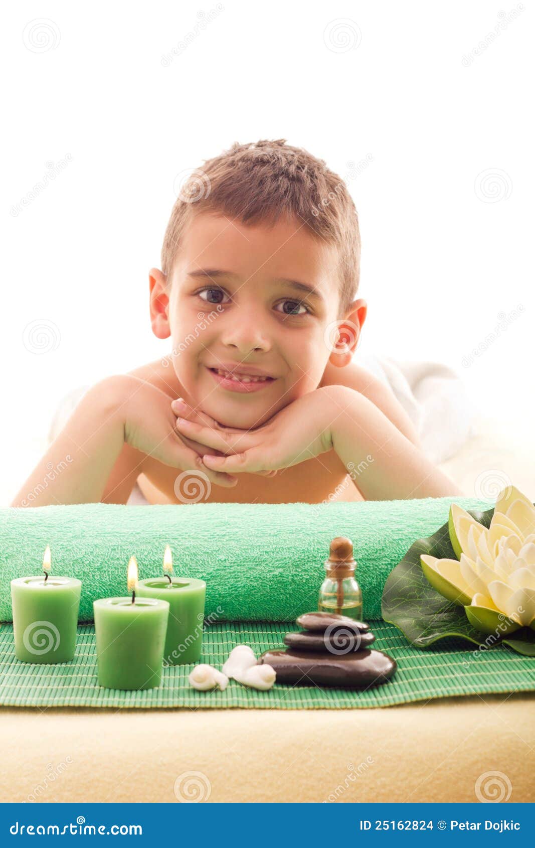 Smiling Boy Lying on the Massage Table Stock Photo - Image of table ...