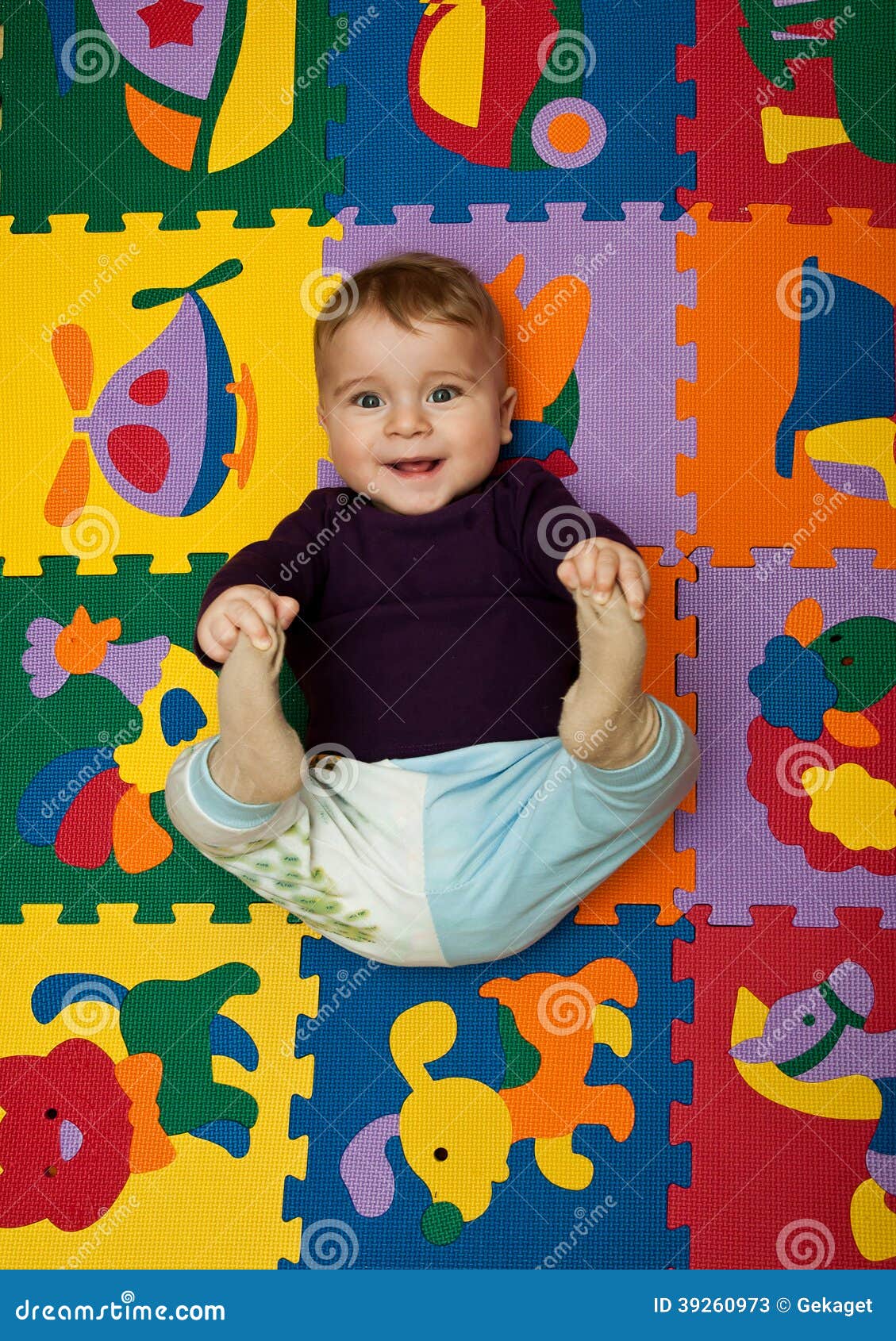 Smiling Boy Lying on the Puzzle Stock Image - Image of learning ...