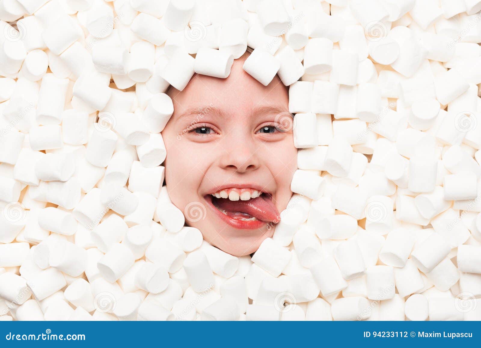 Smiling Boy in Marshmallows Stock Photo - Image of child, dessert: 94233112