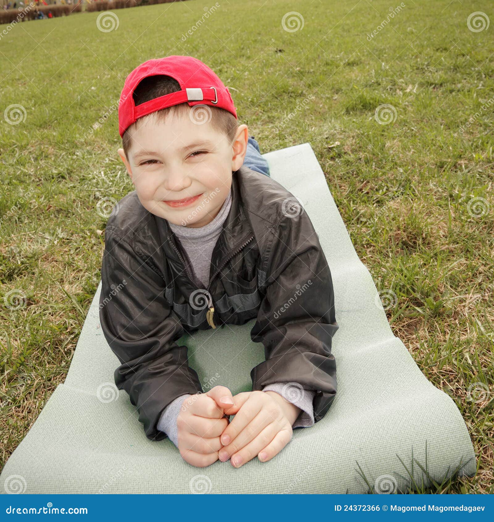 Smiling boy on mat stock photo. Image of happiness, person - 24372366