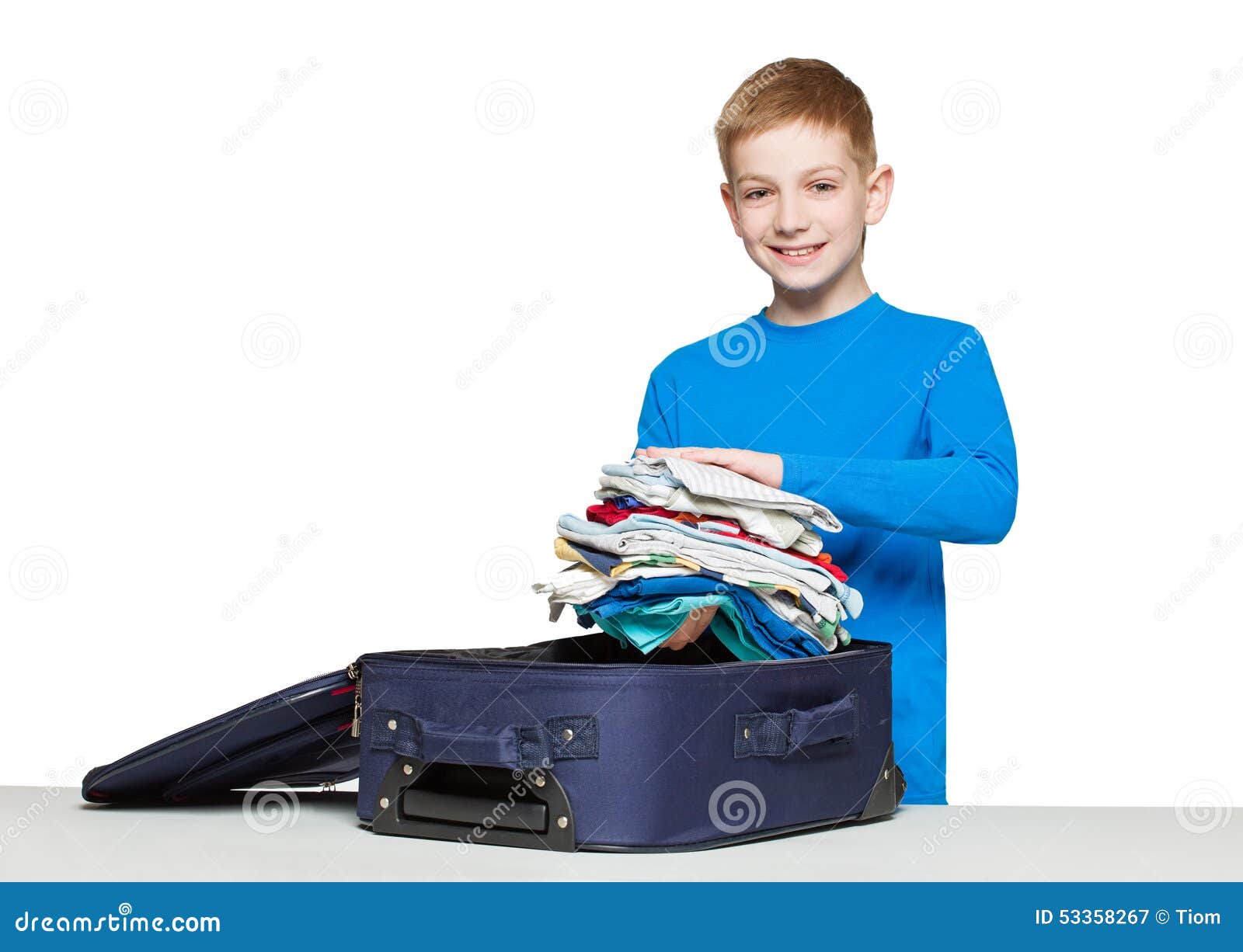 Smiling Boy Packing Luggage Bag with Clothes Stock Image - Image of ...