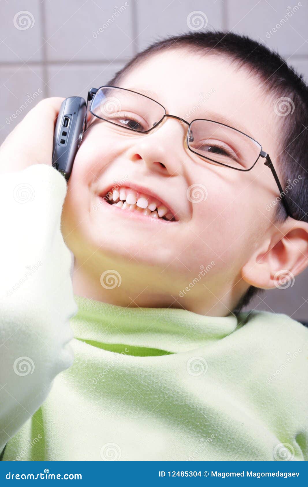 Smiling boy on phone stock photo. Image of caucasian - 12485304