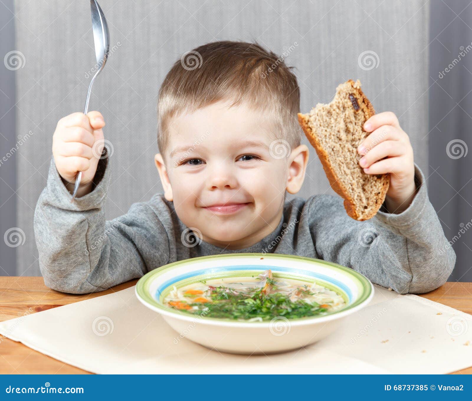 Smiling Boy with Plate of Soup for Dinner Stock Image - Image of ...