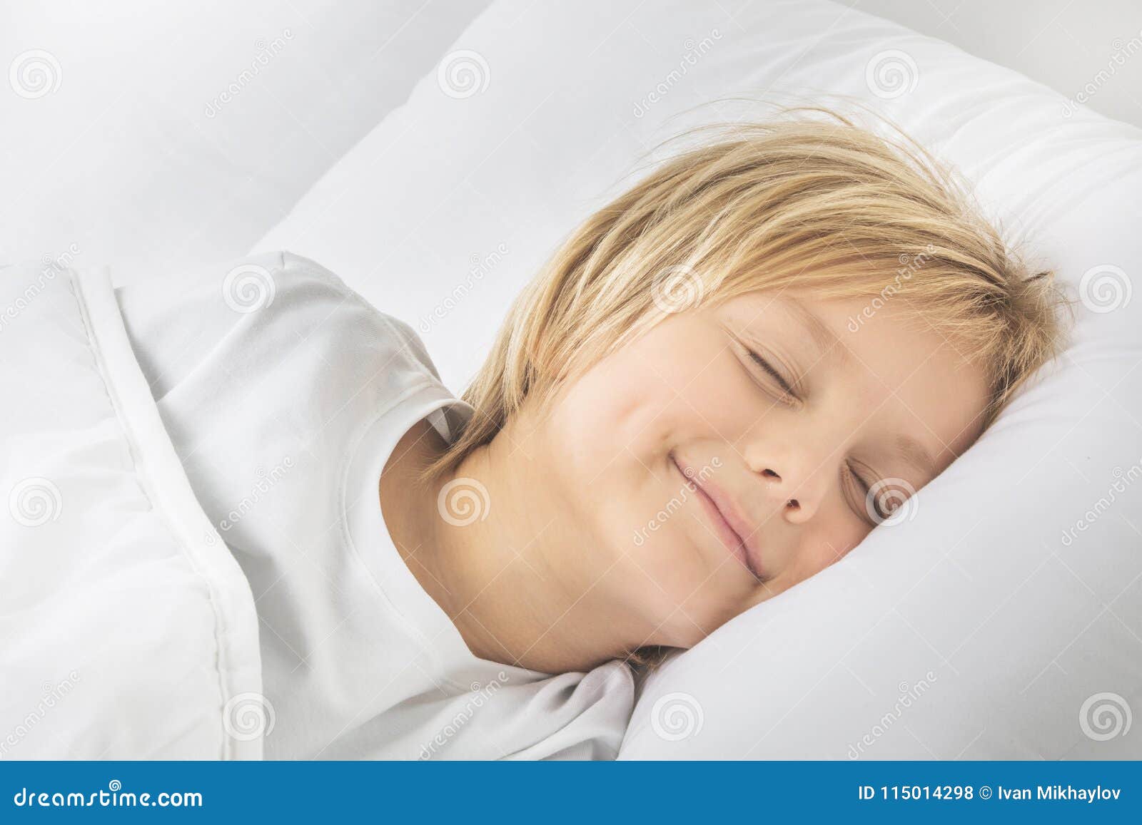 Smiling boy sleep in bed stock photo. Image of healthy - 115014298 Smiling boy sleep in bed stock photo. Image of healthy - 115014298