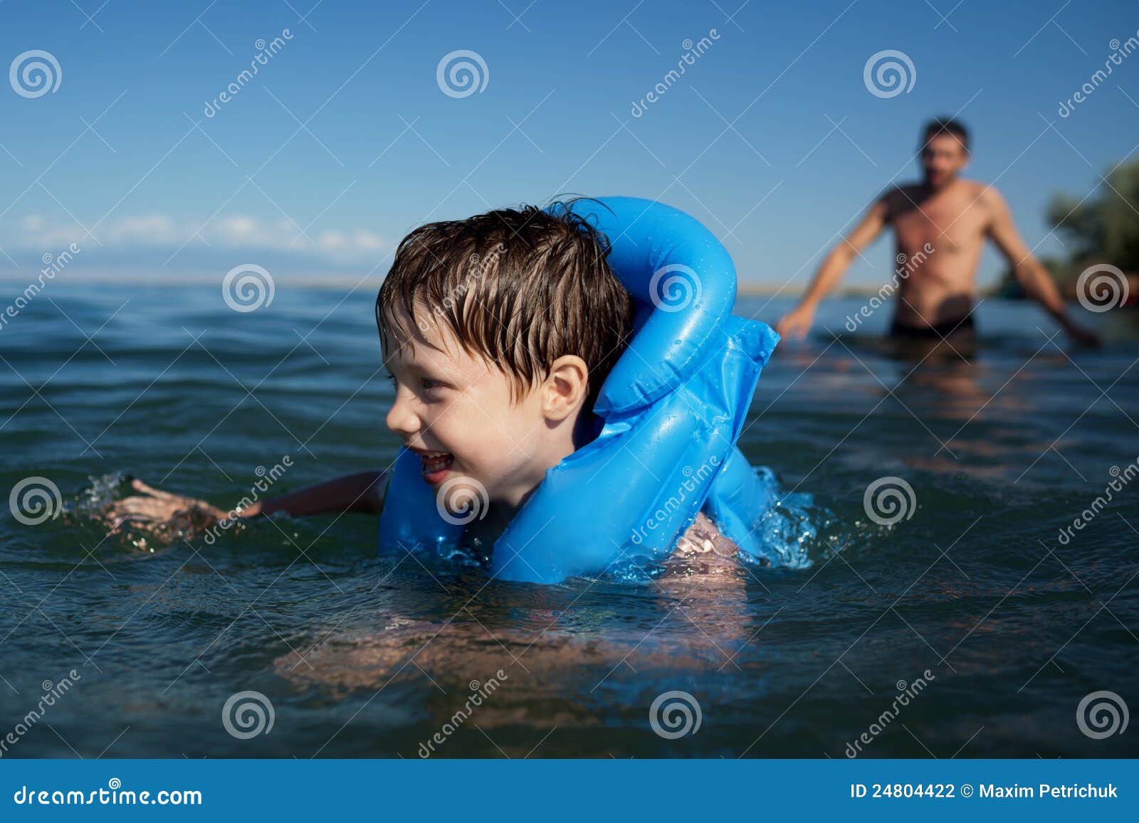 Smiling boy swimming stock photo. Image of river, vest - 24804422