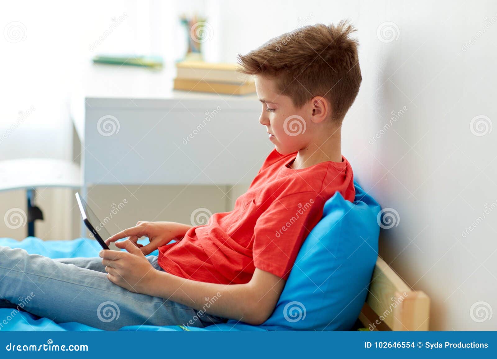 Smiling Boy with Tablet Pc Computer at Home Stock Photo - Image of male ...