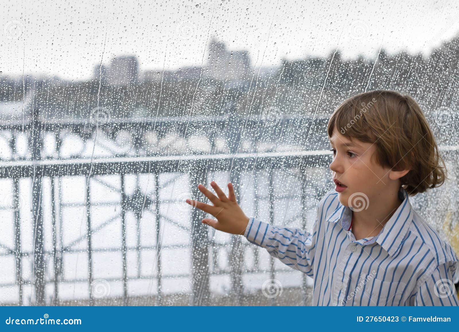 Smiling Boy Watching the Rain Outside at a Window Stock Image - Image ...
