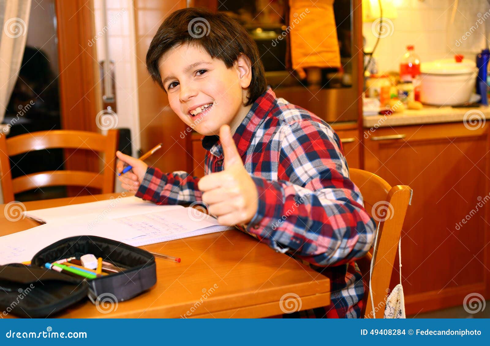 Smiling BOY Writes on His Notebook Stock Photo - Image of pencil, child ...