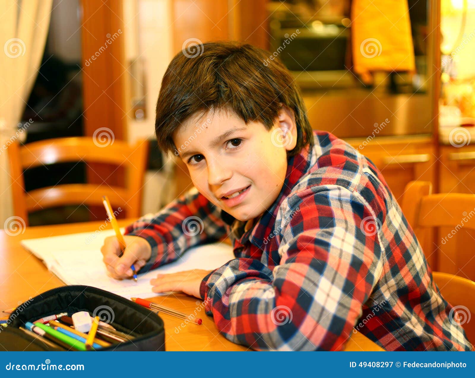 Smiling BOY Writes on His Notebook Stock Image - Image of notebook ...