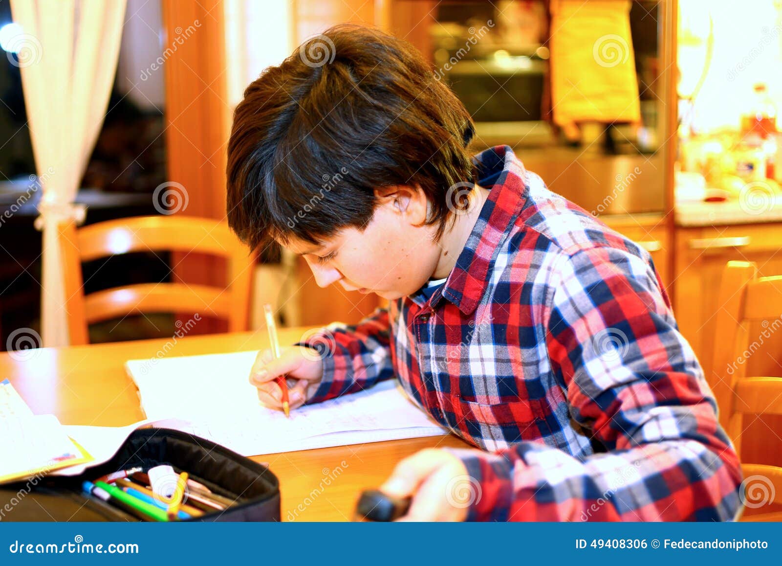 Smiling BOY Writes on His Notebook Stock Photo - Image of work ...