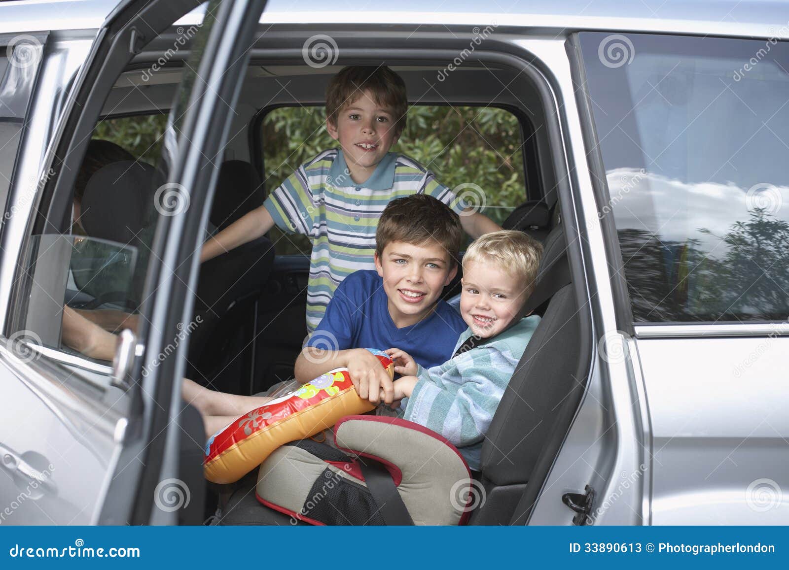 Smiling Boys in Car stock image. Image of sibling, caucasian - 33890613