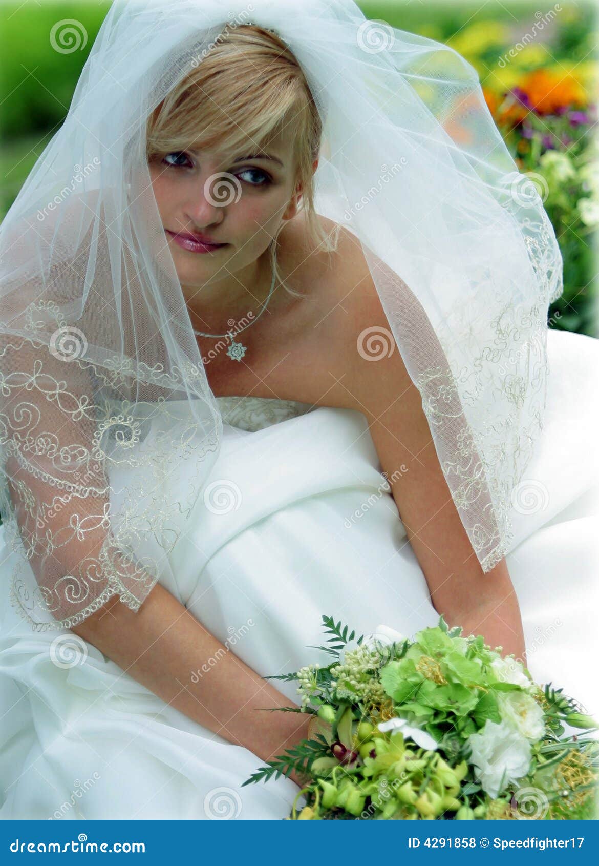 Smiling bride with bouquet stock photo. Image of flower - 4291858