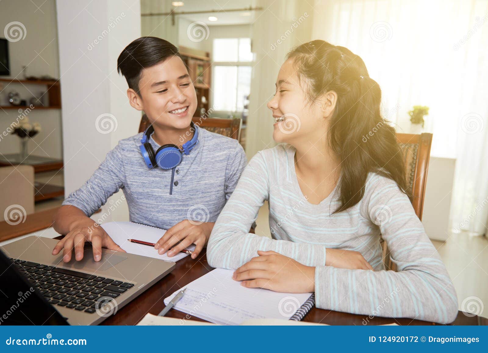 Siblings doing homework stock photo. Image of enjoying - 124920172