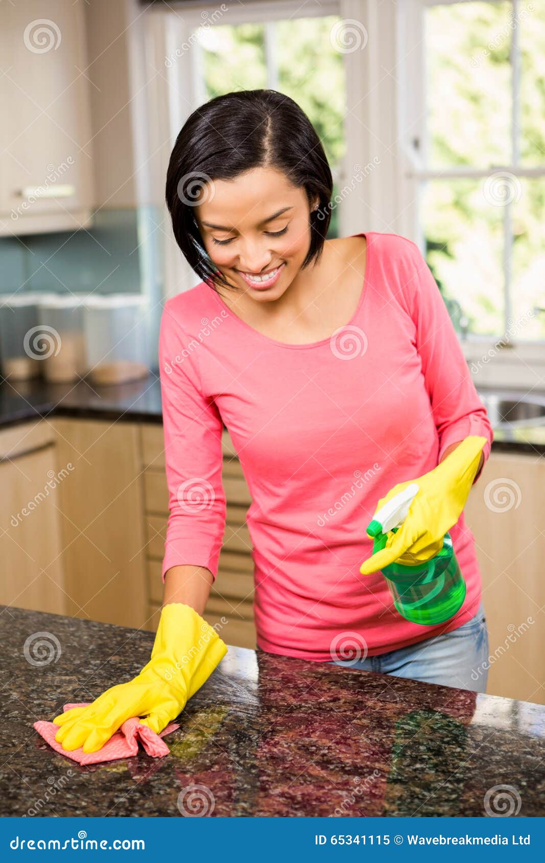 Smiling Brunette Cleaning Kitchen Counter Stock Image - Image of female ...