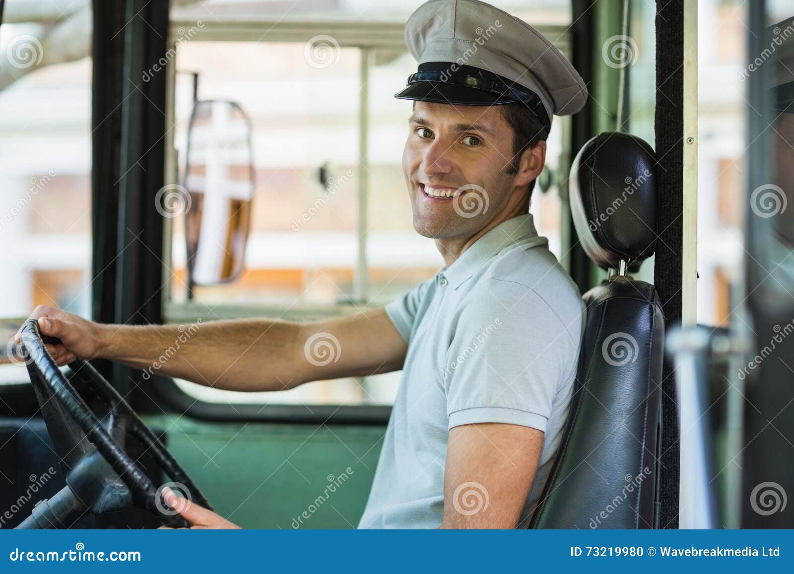 Smiling Bus Driver Driving a Bus Stock Photo - Image of adult, happy ...