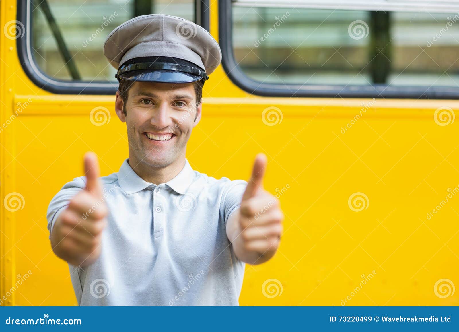Smiling Bus Driver Showing Thumbs Up in Front of Bus Stock Image ...