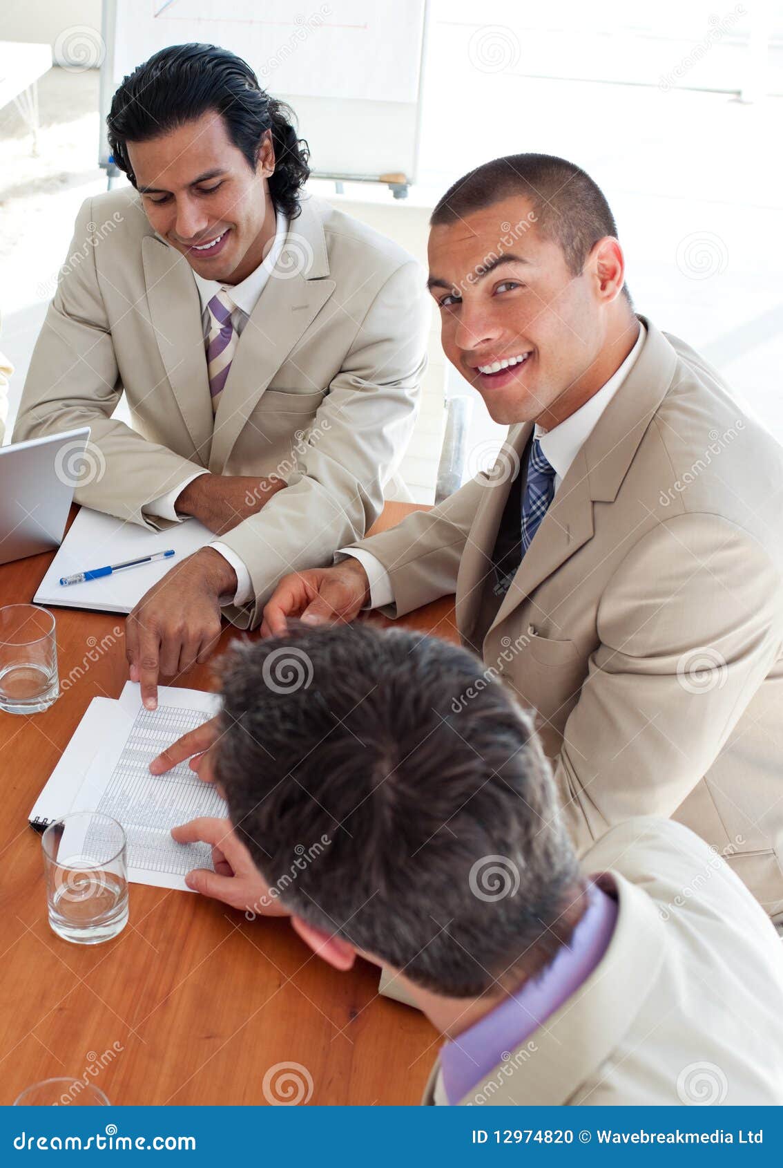 Smiling Business Co-workers in a Meeting Stock Photo - Image of ...