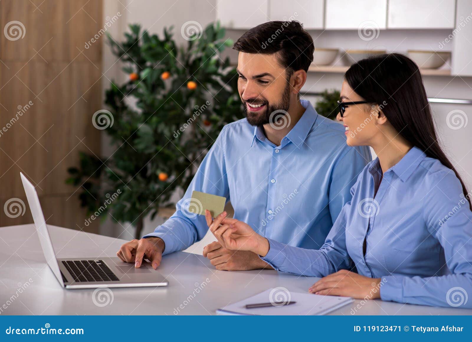 Smiling Business Colleagues Using Online Banking System Stock Image ... Smiling Business Colleagues Using Online Banking System Stock Image ...