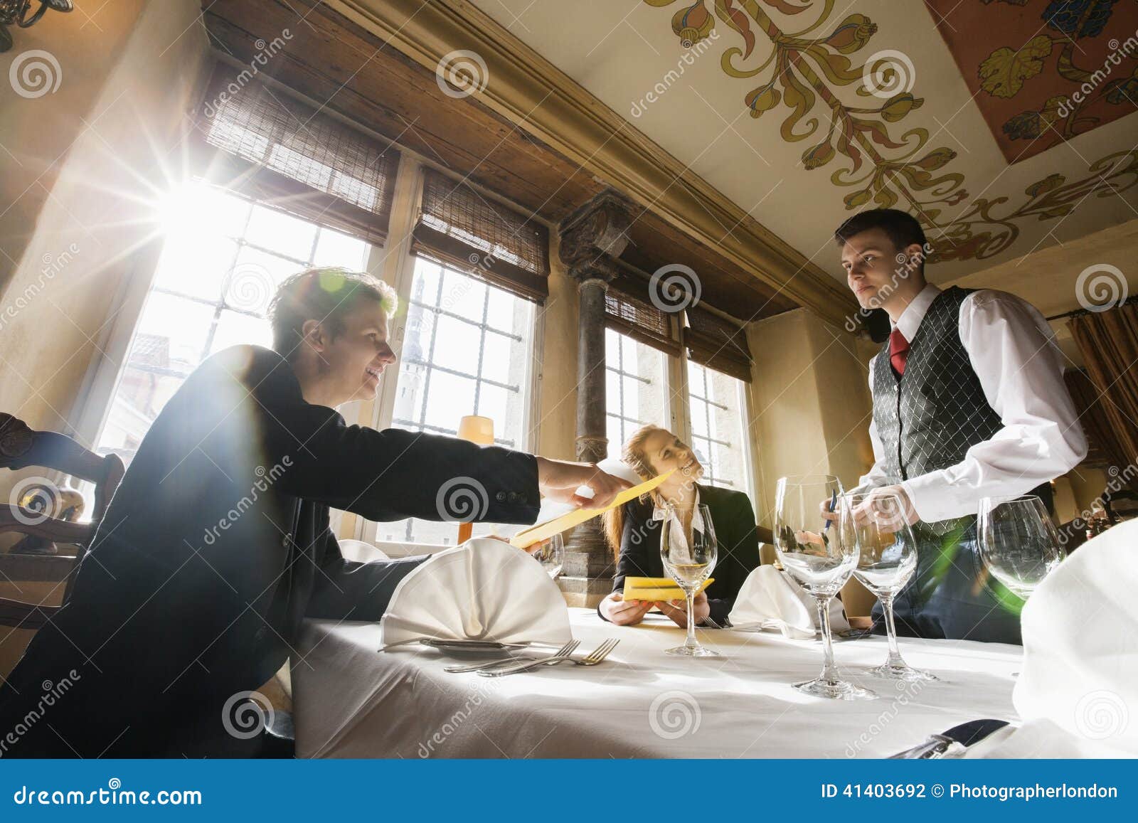 Smiling Business Couple Ordering Food at Restaurant Table Stock Photo ...