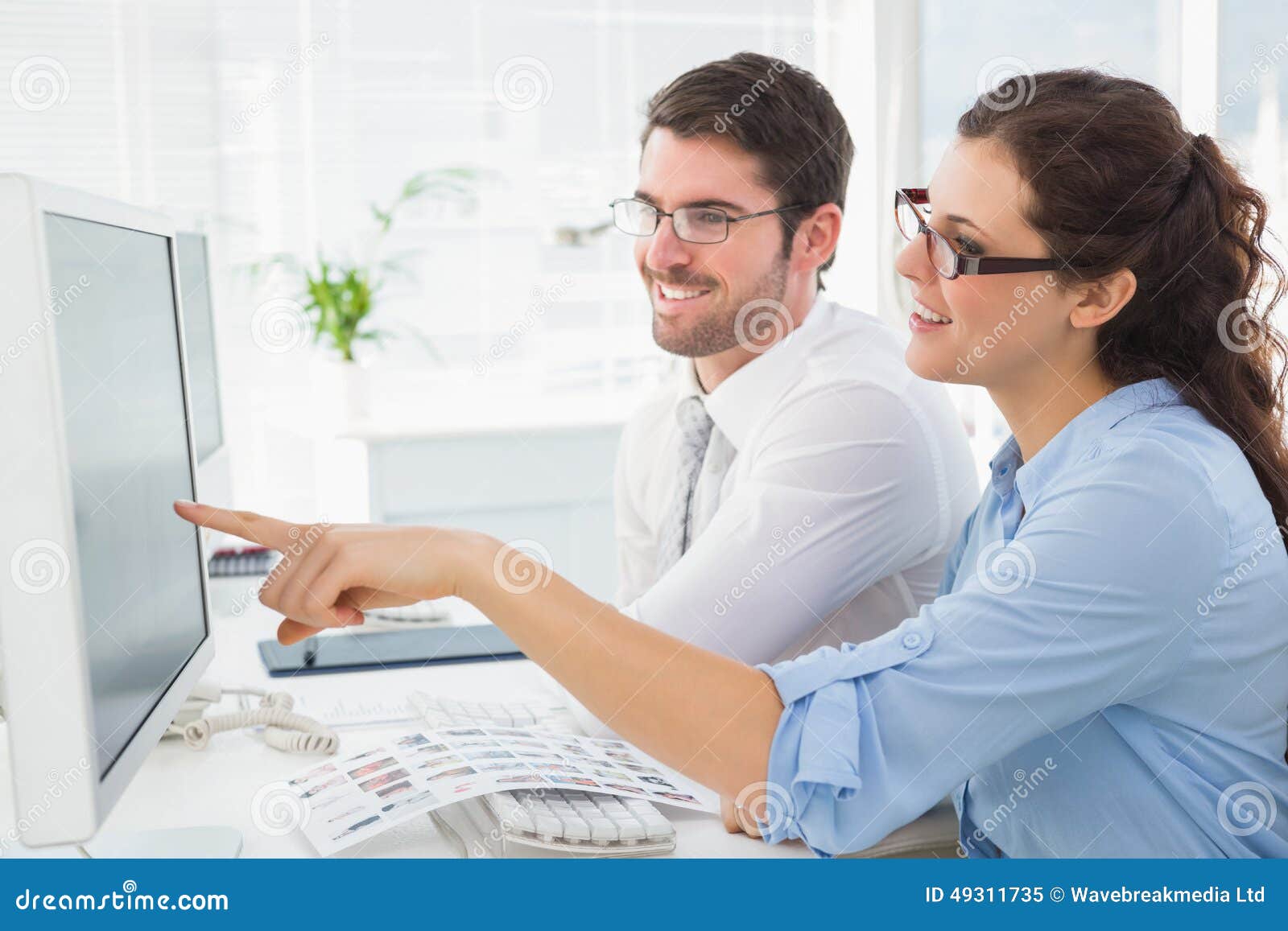 Smiling Business Coworkers Pointing Screen of Computer Stock Image ...