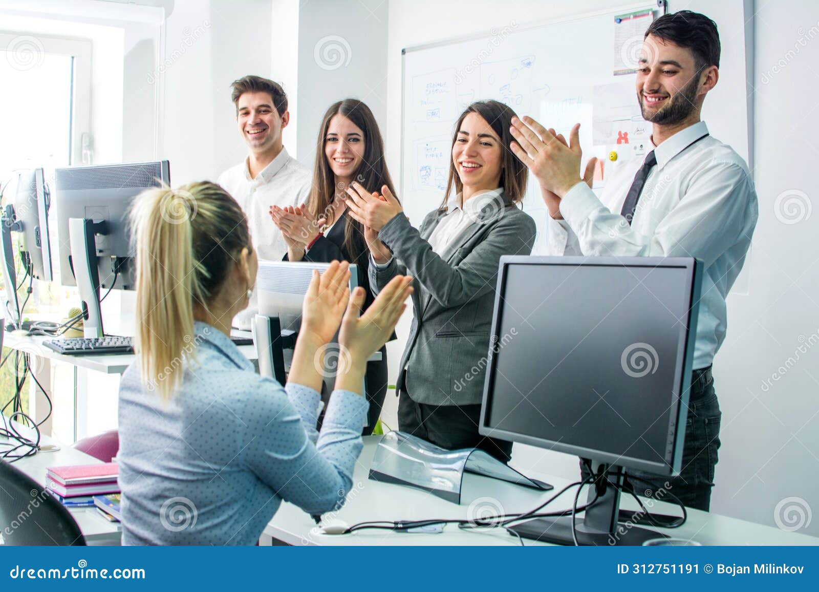 Smiling Business Group Clapping Hands at the Meeting. Stock Image ...