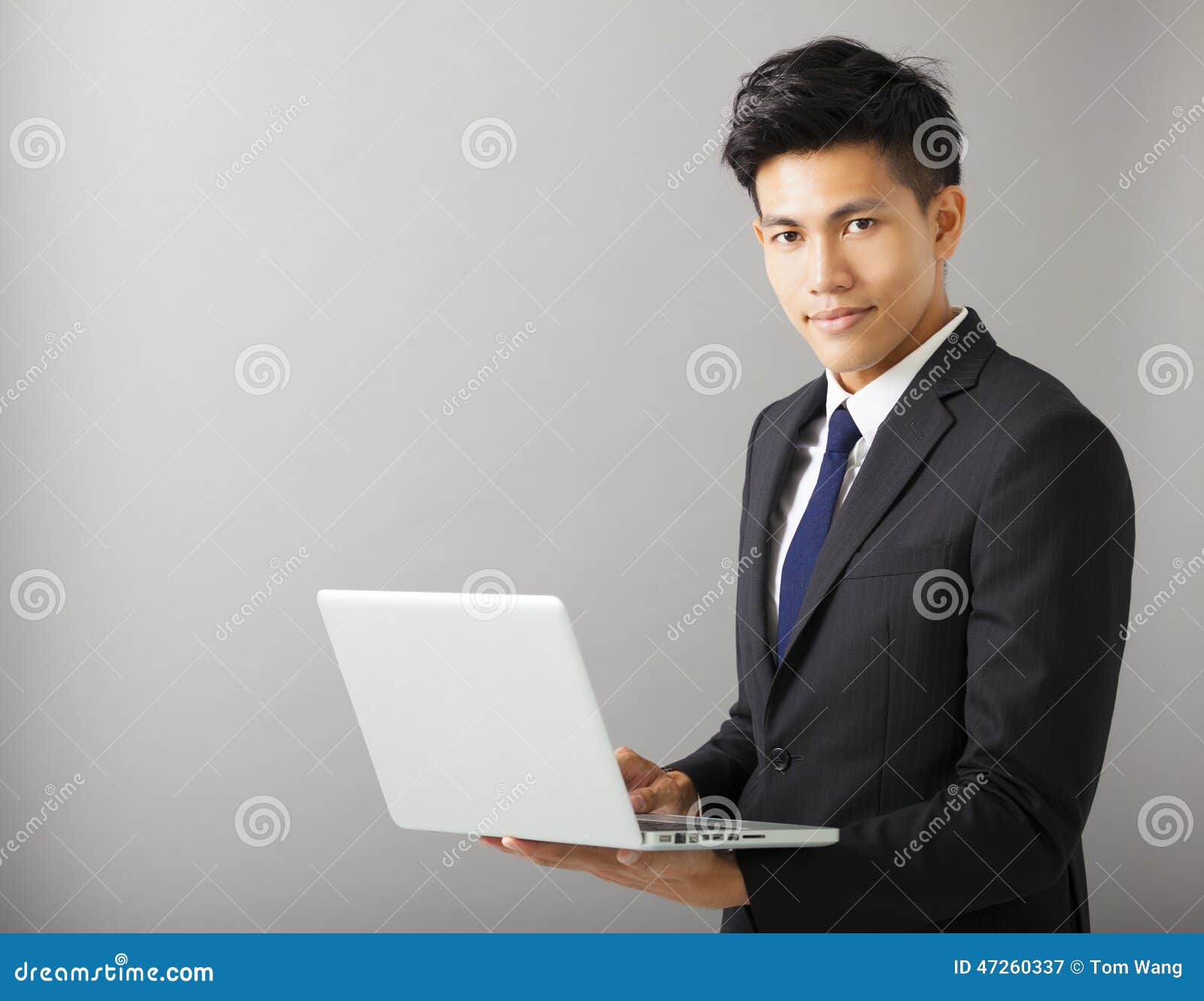 Smiling Business Man Holding Laptop Stock Image - Image of asian ...