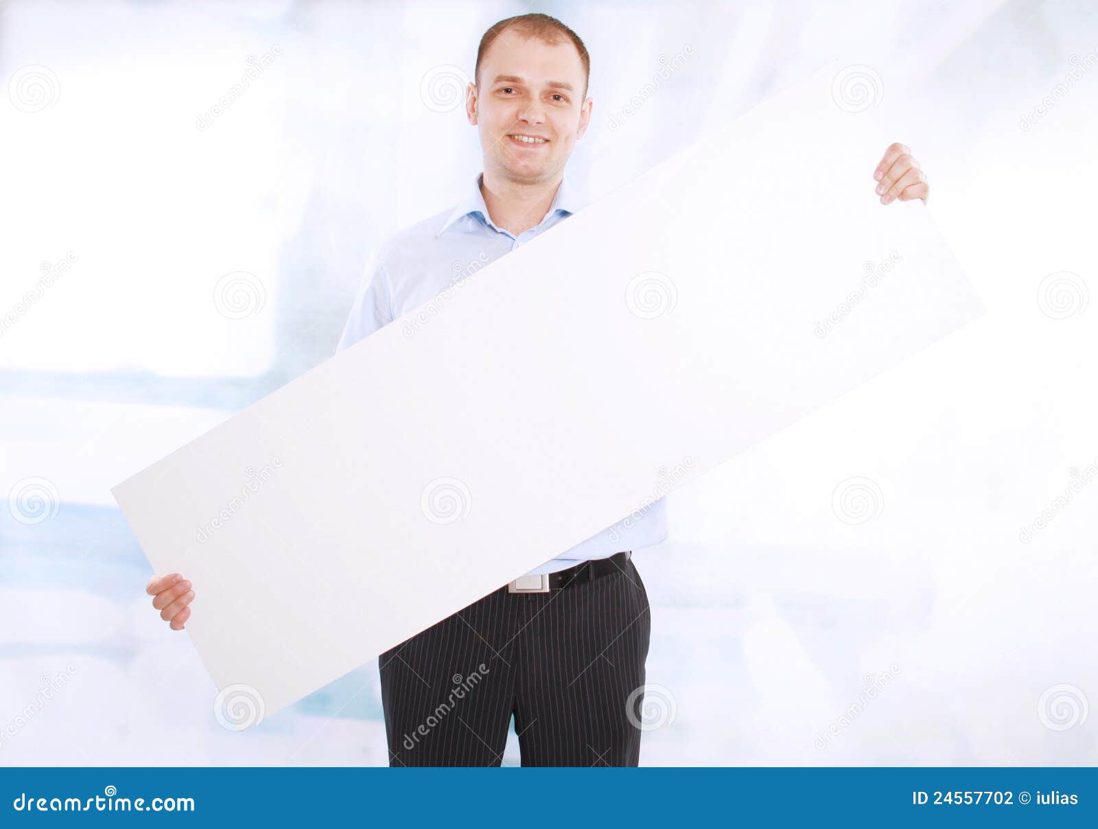 Smiling Business Man Presents a White Banner Stock Photo - Image of ...