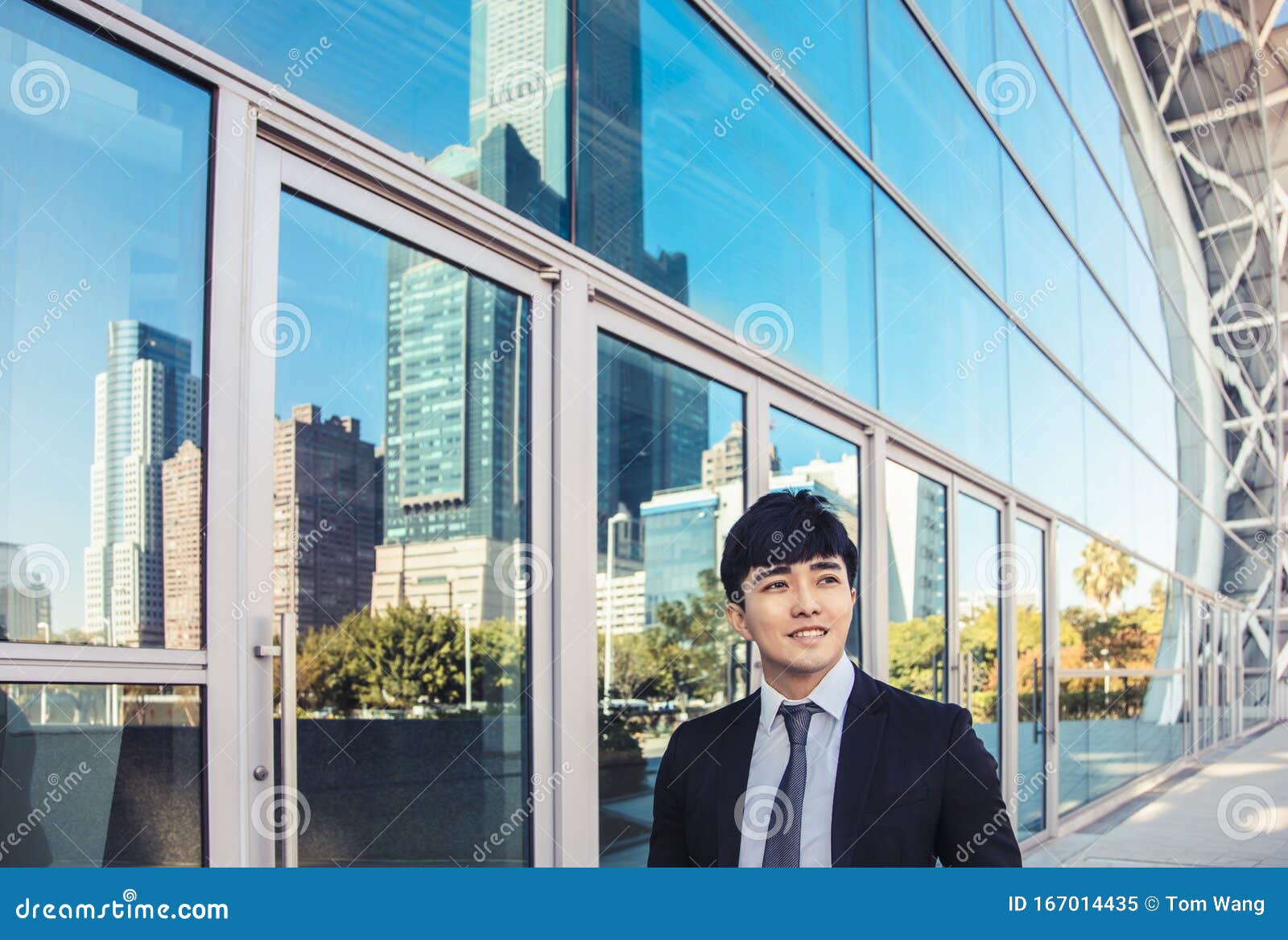 Smiling Business Man Standing in Front of Office Building Stock Image ...