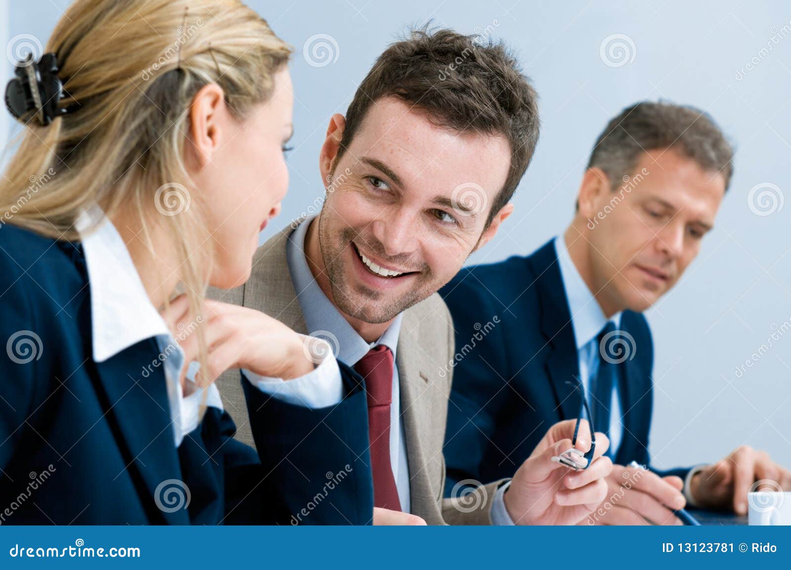 Smiling Business Man Talking with Colleagues Stock Image - Image of ...