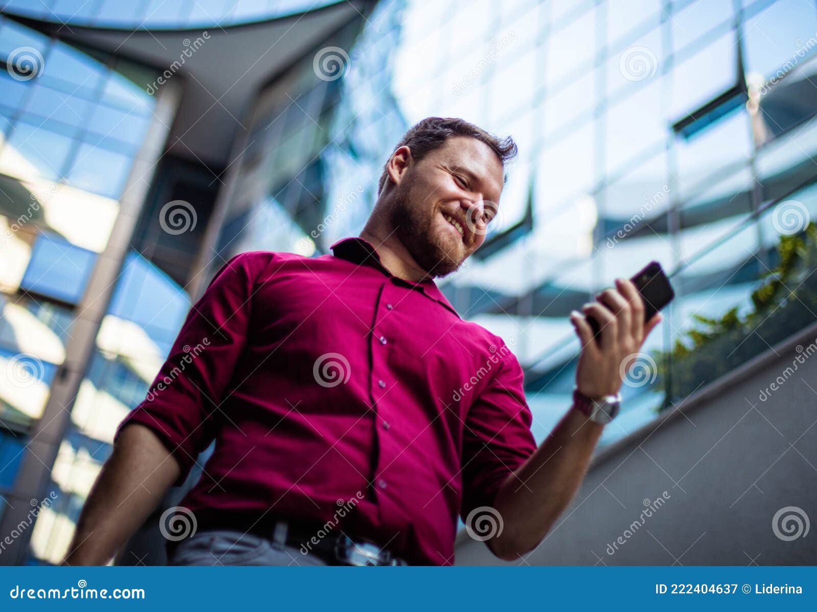 Smiling Business Man Walking and Using Mobile Stock Image - Image of ...