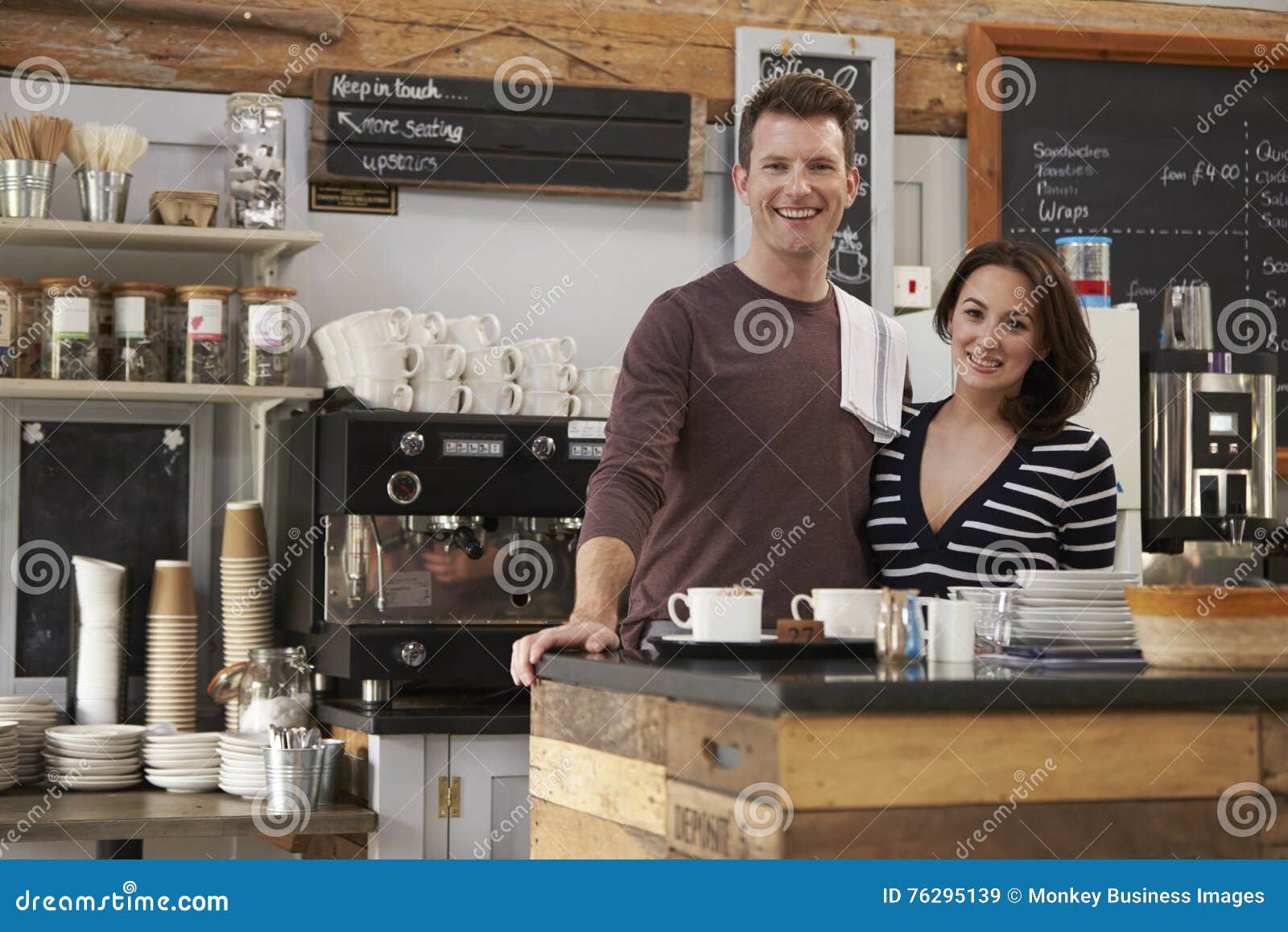 Smiling Business Owners Behind the Counter of Their Cafe Stock Image ...