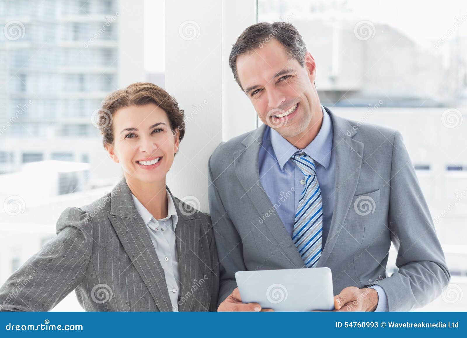Smiling Business Partners Looking at Camera Stock Image - Image of ...