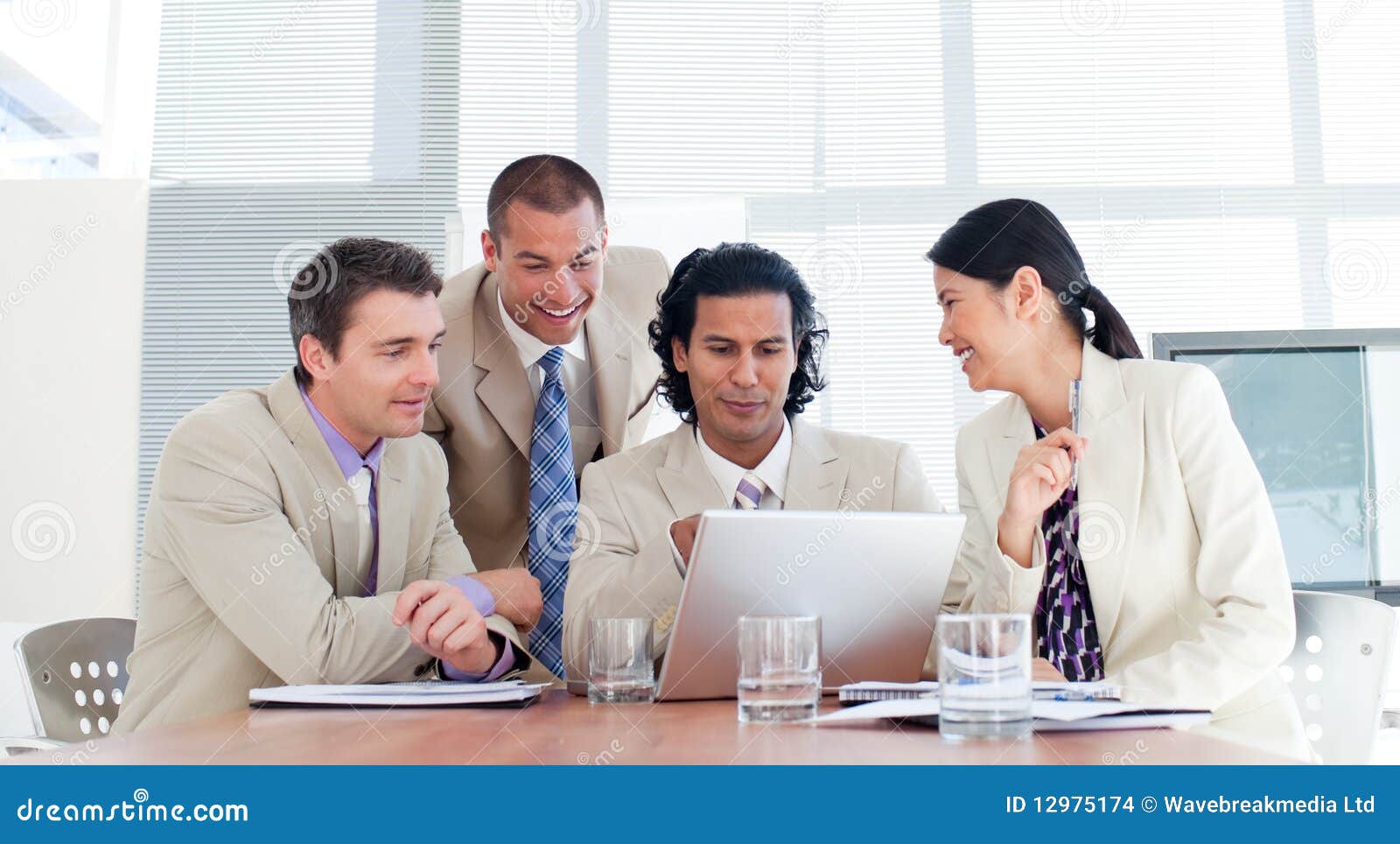 Smiling Business Partners in a Meeting Stock Photo - Image of multi ...