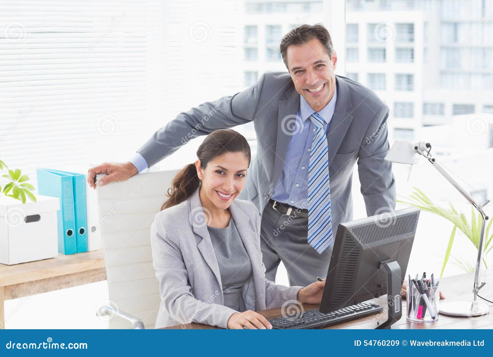 Smiling Business Partners Working Together Stock Image - Image of ...