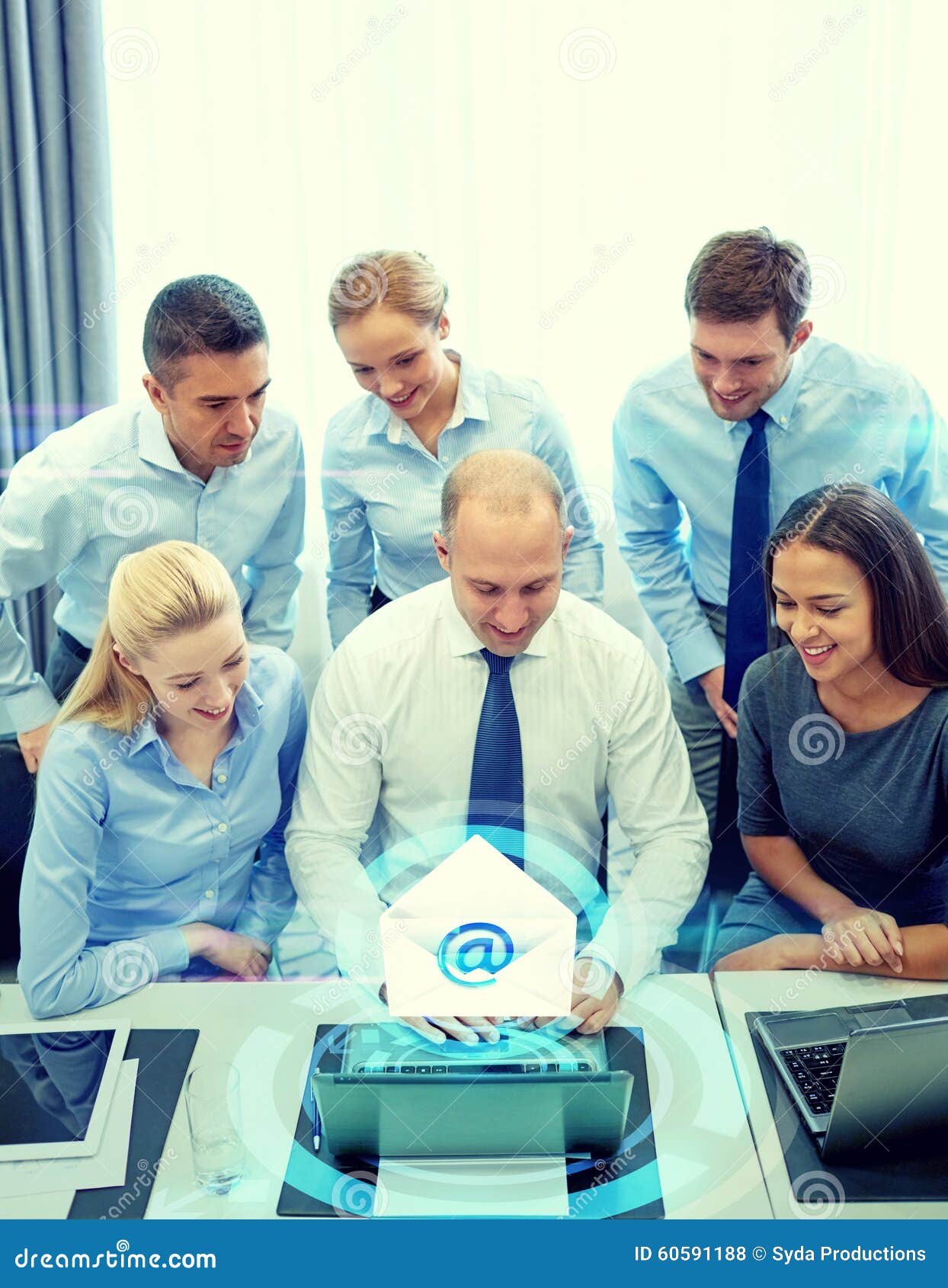 Smiling Business People with Laptop in Office Stock Photo - Image of ...