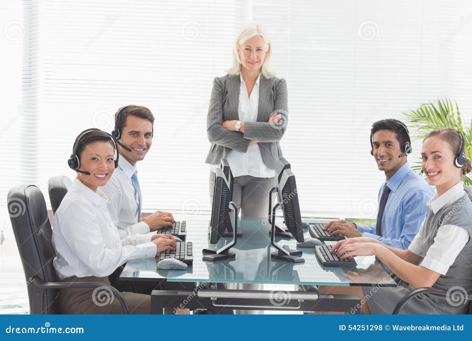 Smiling Business People Looking at Camera Stock Photo - Image of ...