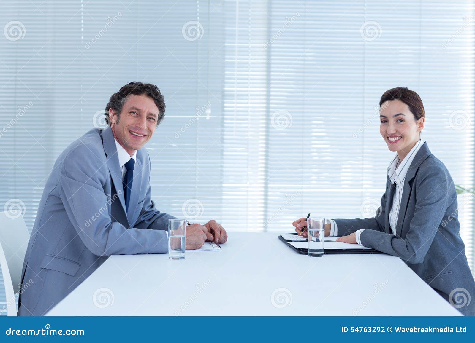 Smiling Business People Looking at Camera Stock Photo - Image of ...