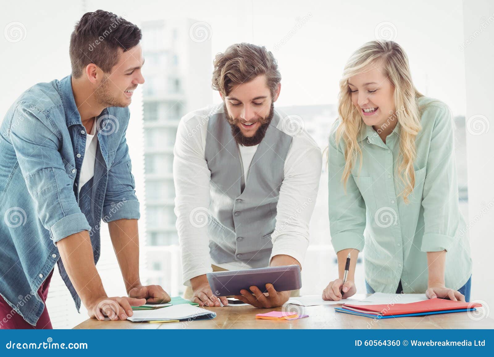 Smiling Business Professionals Using Digital Tablet Stock Photo - Image ...
