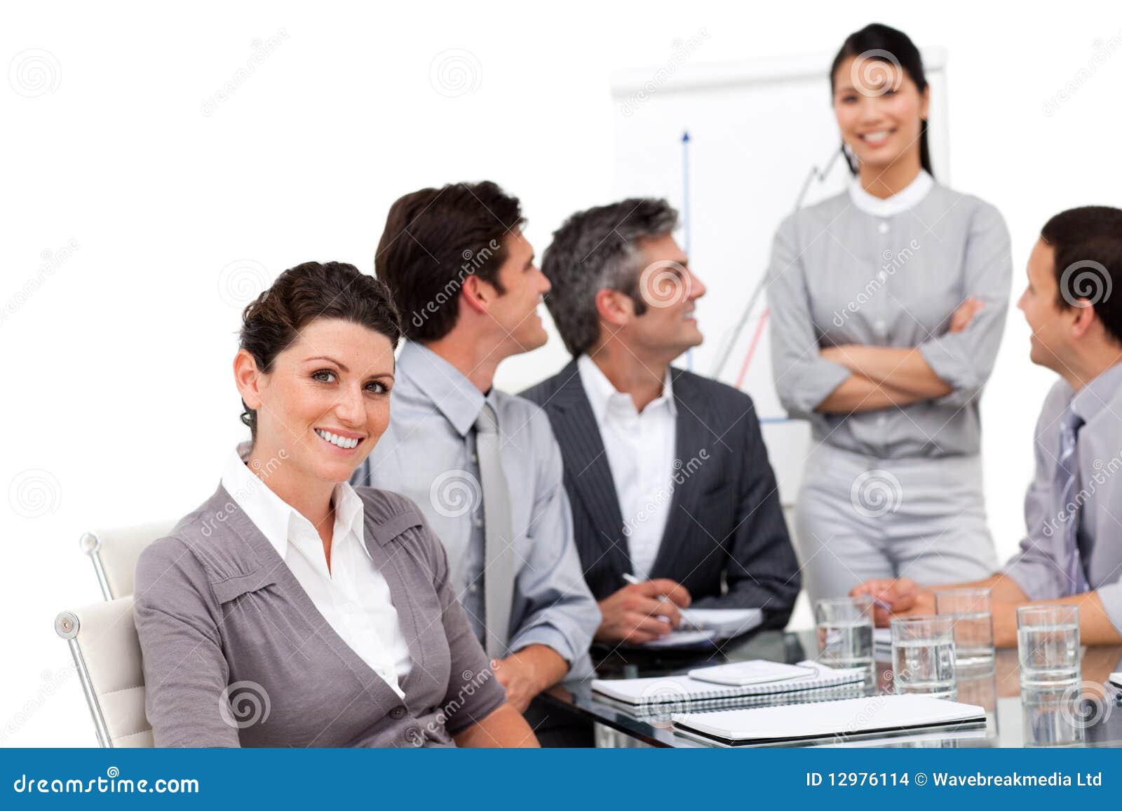 Smiling Business Team during a Presentation Stock Photo - Image of ...