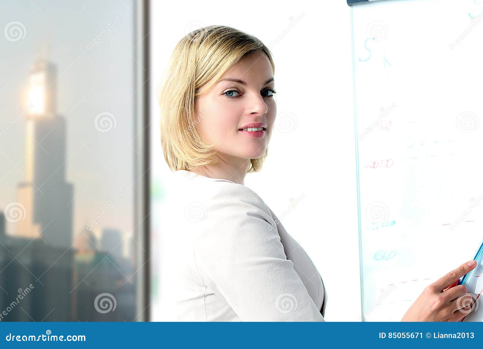Smiling Business Woman Presenting. Presentation on a Background Stock ...