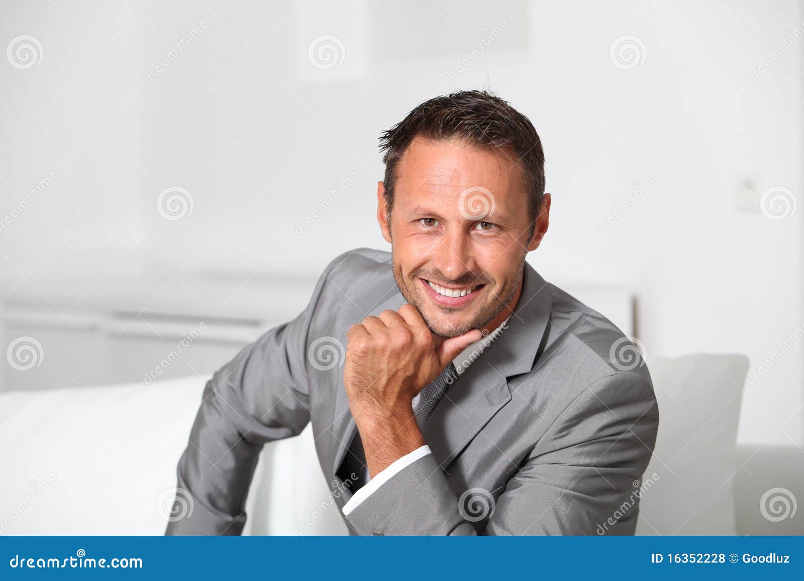 Smiling businessman stock photo. Image of blond, formal - 16352228